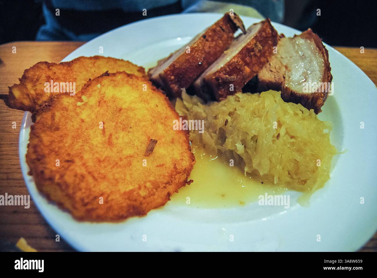 Beer roast with sauerkraut at a brewery in Germany Stock Photo - Alamy