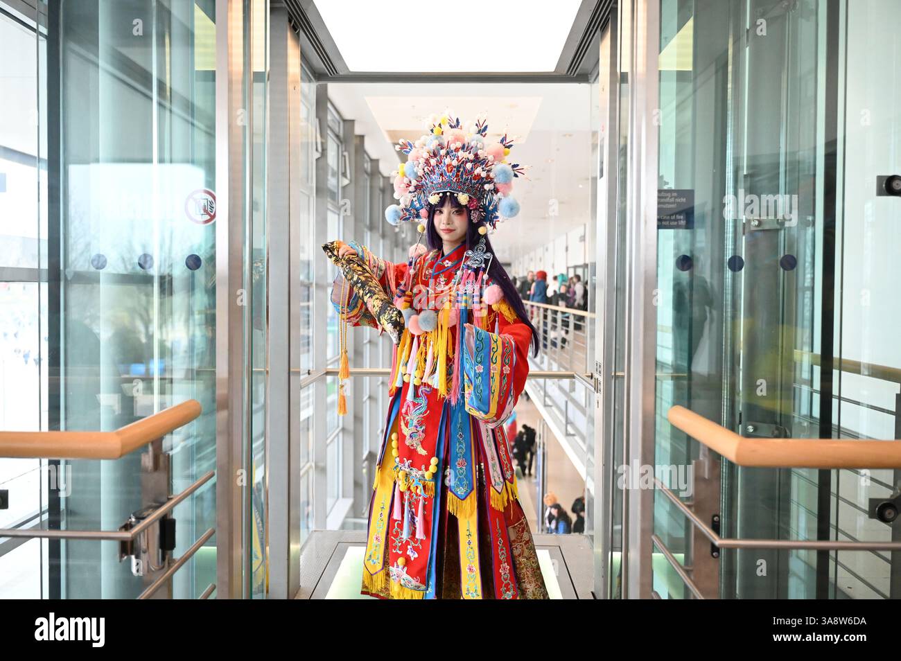 Leipzig, Germany. 29th Mar, 2025. Cosplayer Fungilierxica poses in ...