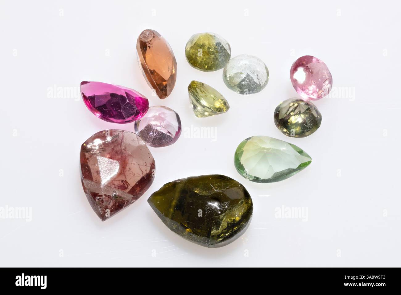 Collection of Multicolored Faceted Tourmaline Gemstones Against White ...