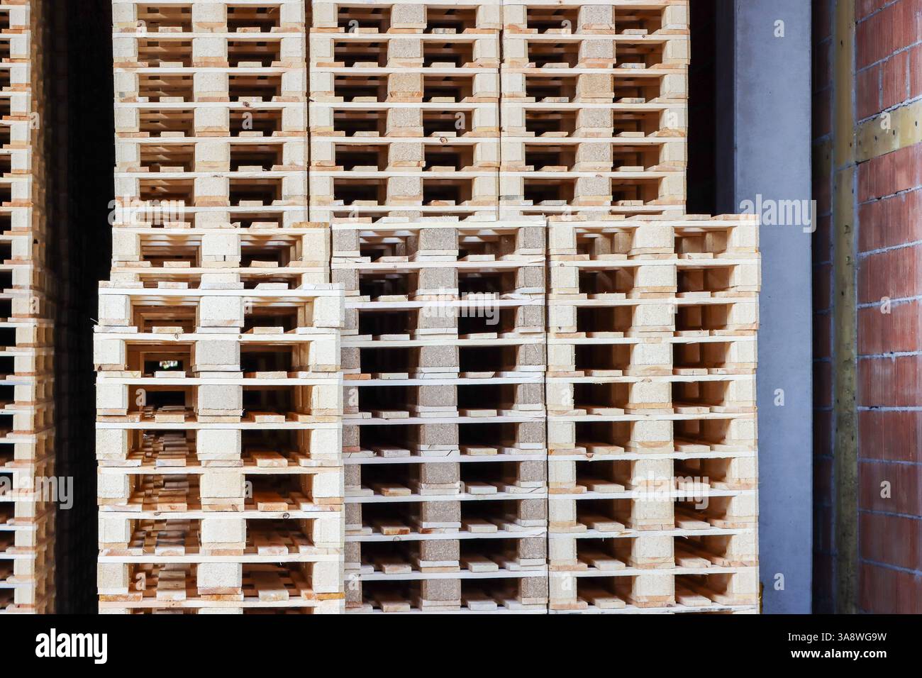 large warehouse for storing wooden pallets Stock Photo - Alamy