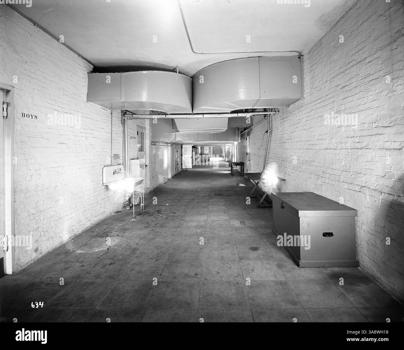A photograph of the basement corridor at Madison School, showcasing the ...