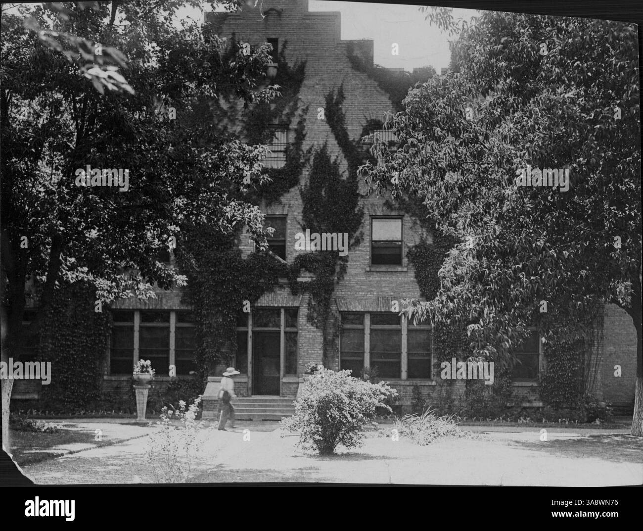 The entrance to the Old Workhouse, a historical building, is shown. The ...