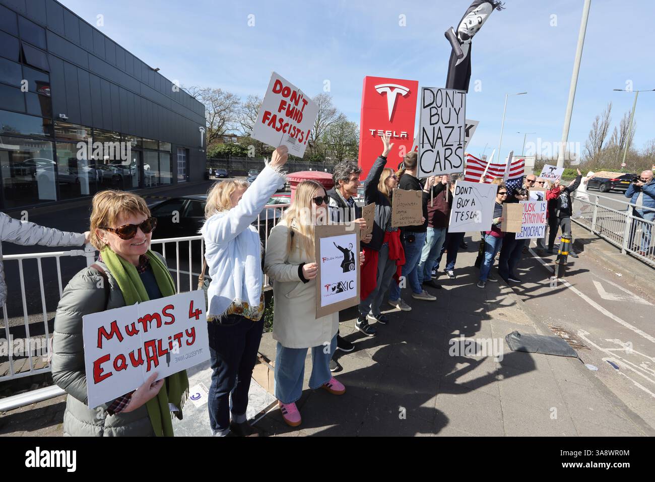 London, UK, 29th March 2025. Demonstrators rallied outside the Tesla ...