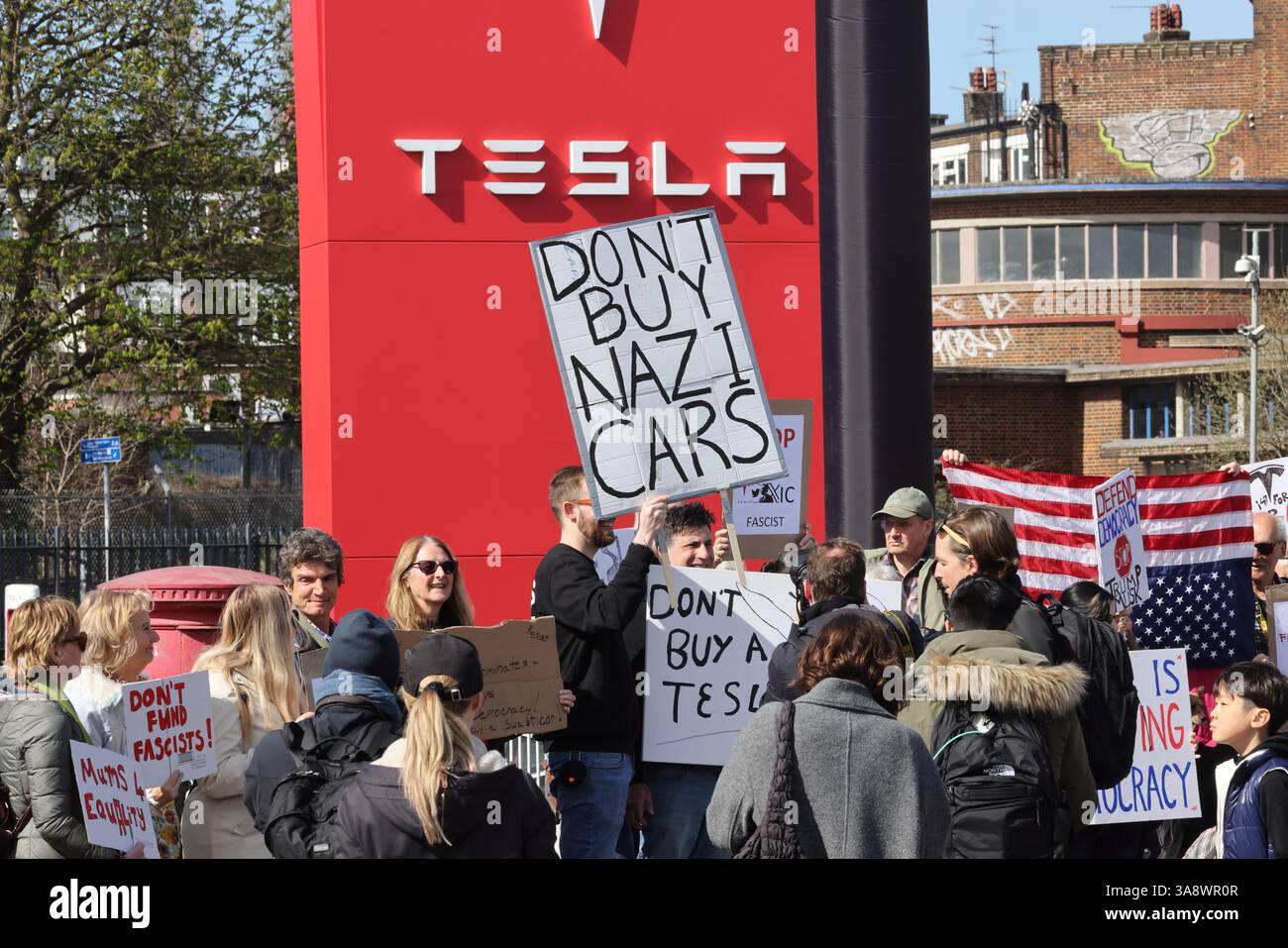 London, UK, 29th March 2025. Demonstrators rallied outside the Tesla ...