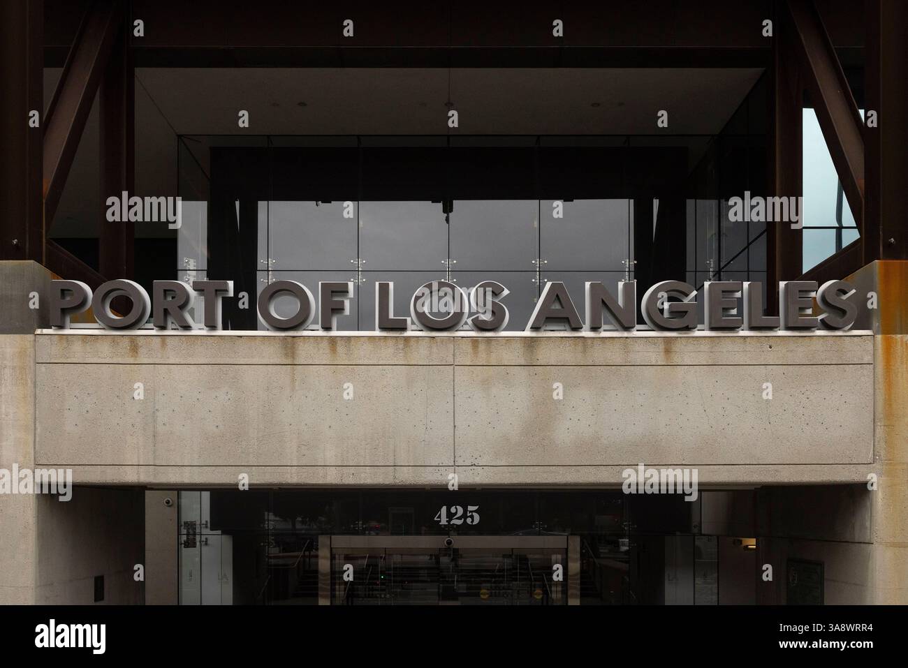 A signage for the Port of Los Angeles is displayed above the entrance ...