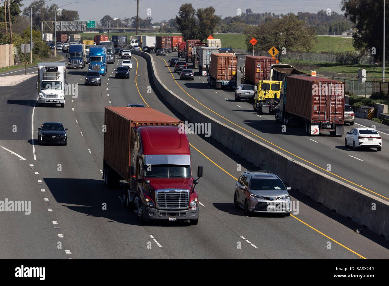 Vehicles move along the 710 highway near the Ports of Los Angeles and ...