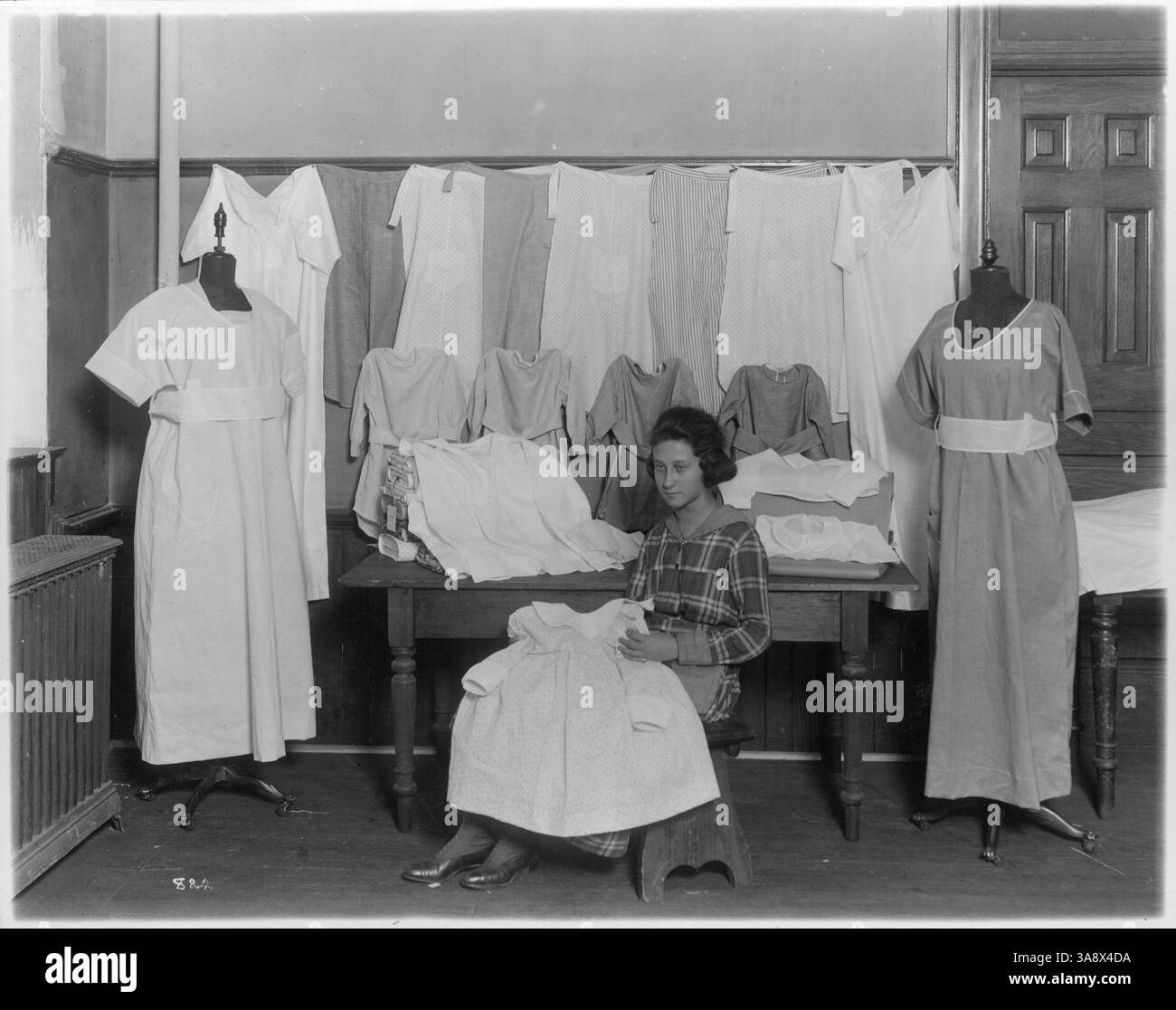 This exhibit from the Girls' Vocational School showcases dressmaking ...