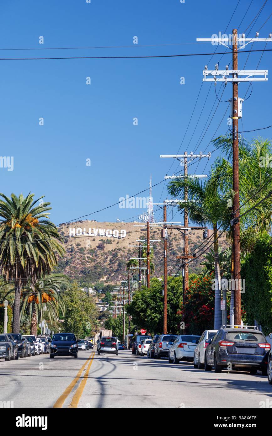 Iconic Los Angeles road stretching toward the Hollywood Hills, with the ...