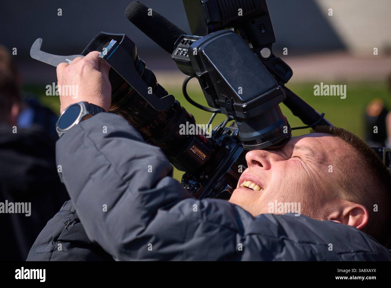 Warsaw, Poland. 29th Mar, 2025. A TV camera operator is seen filming ...