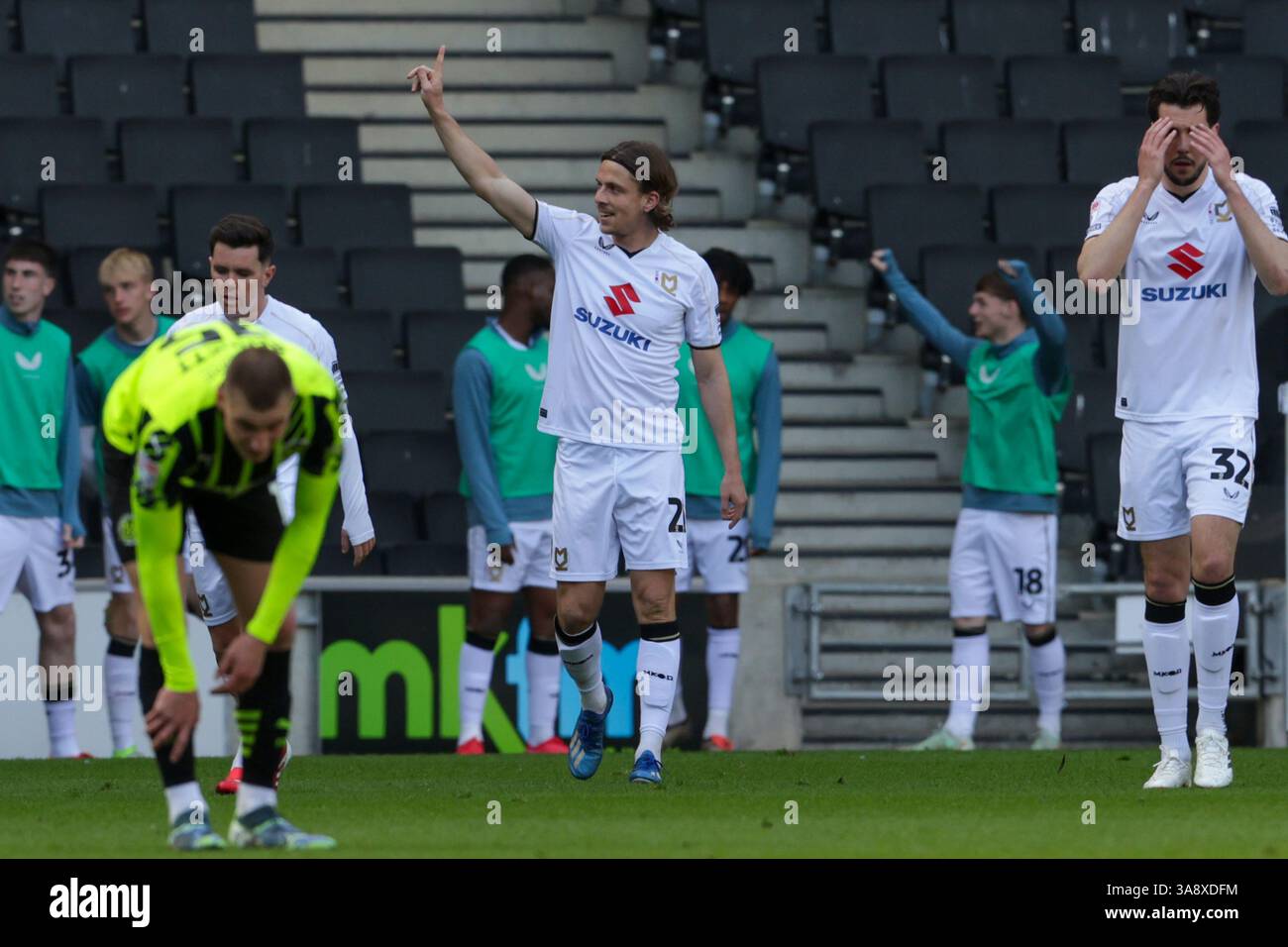 Danilo Orsi-Dadomo celebrates after scoring for MK Dons, to take the ...