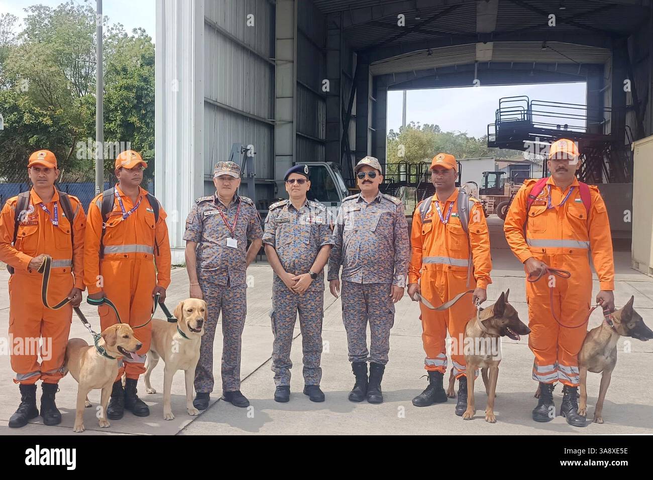 This handout photo provided by India's National Disaster Response Force shows a rescue team ...
