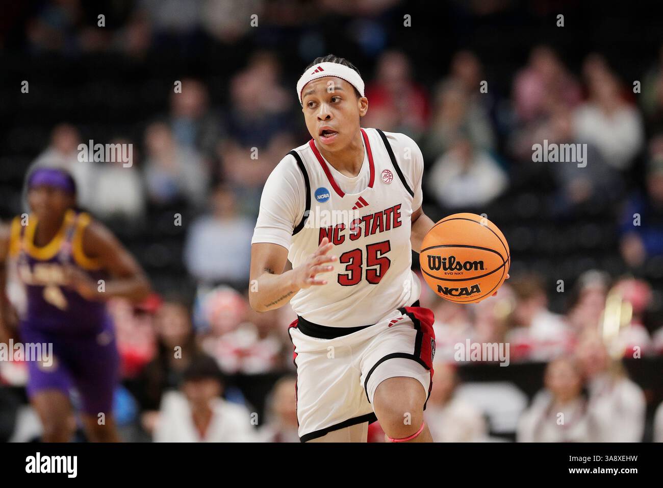 North Carolina State guard Zoe Brooks (35) controls the ball during the ...