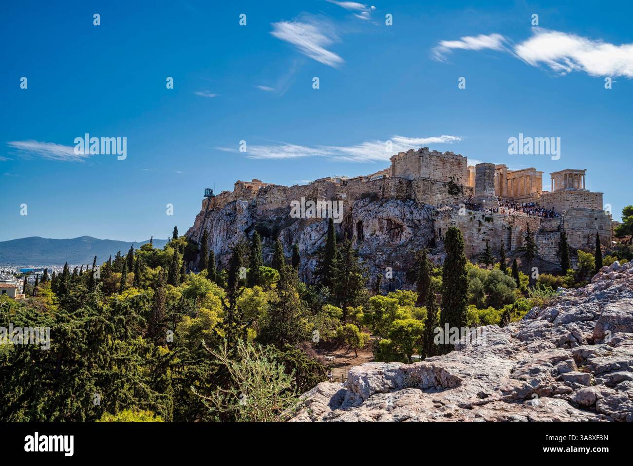Wide view of the Acropolis in Athens, Greece, showing ancient ruins including the Propylaea and ...