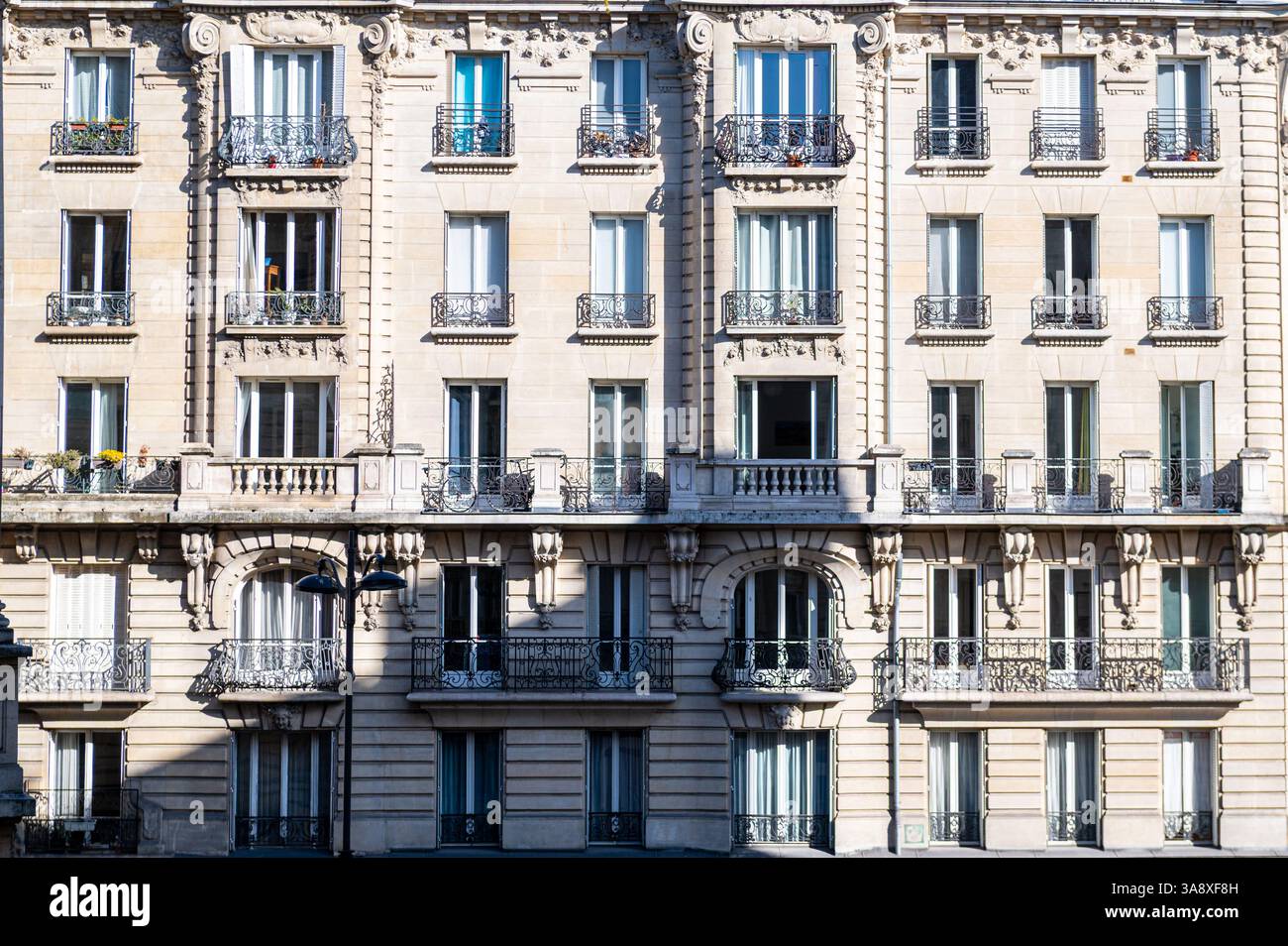 Facade of a typical Haussmann style building in Paris, France Stock ...