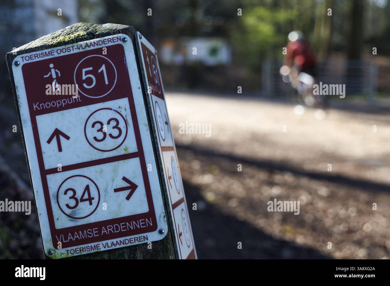 Illustration picture shows a road sign indicating different hiking ...