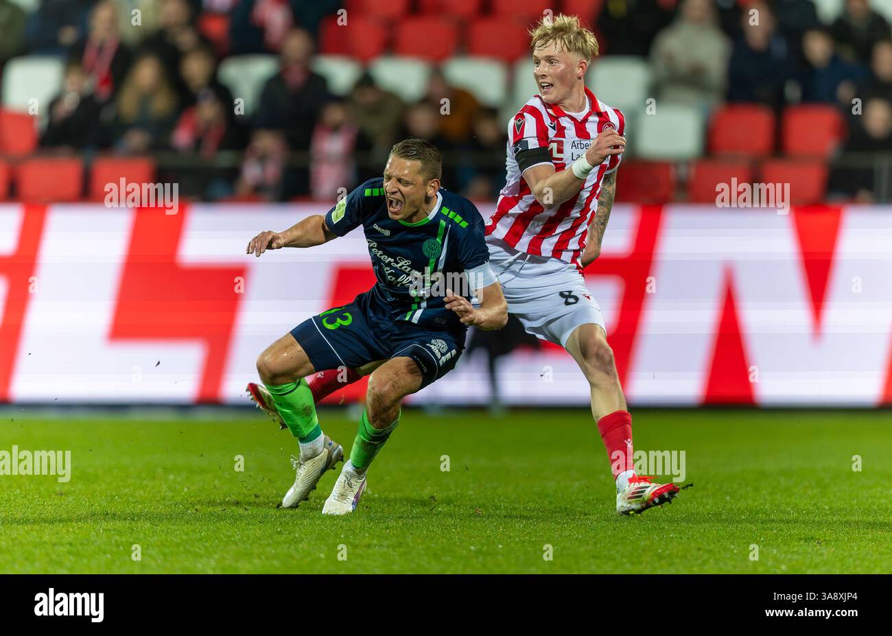 Aalborg, Denmark. 28th Mar, 2025. Jeppe Gronning (13) of Viborg FF and ...