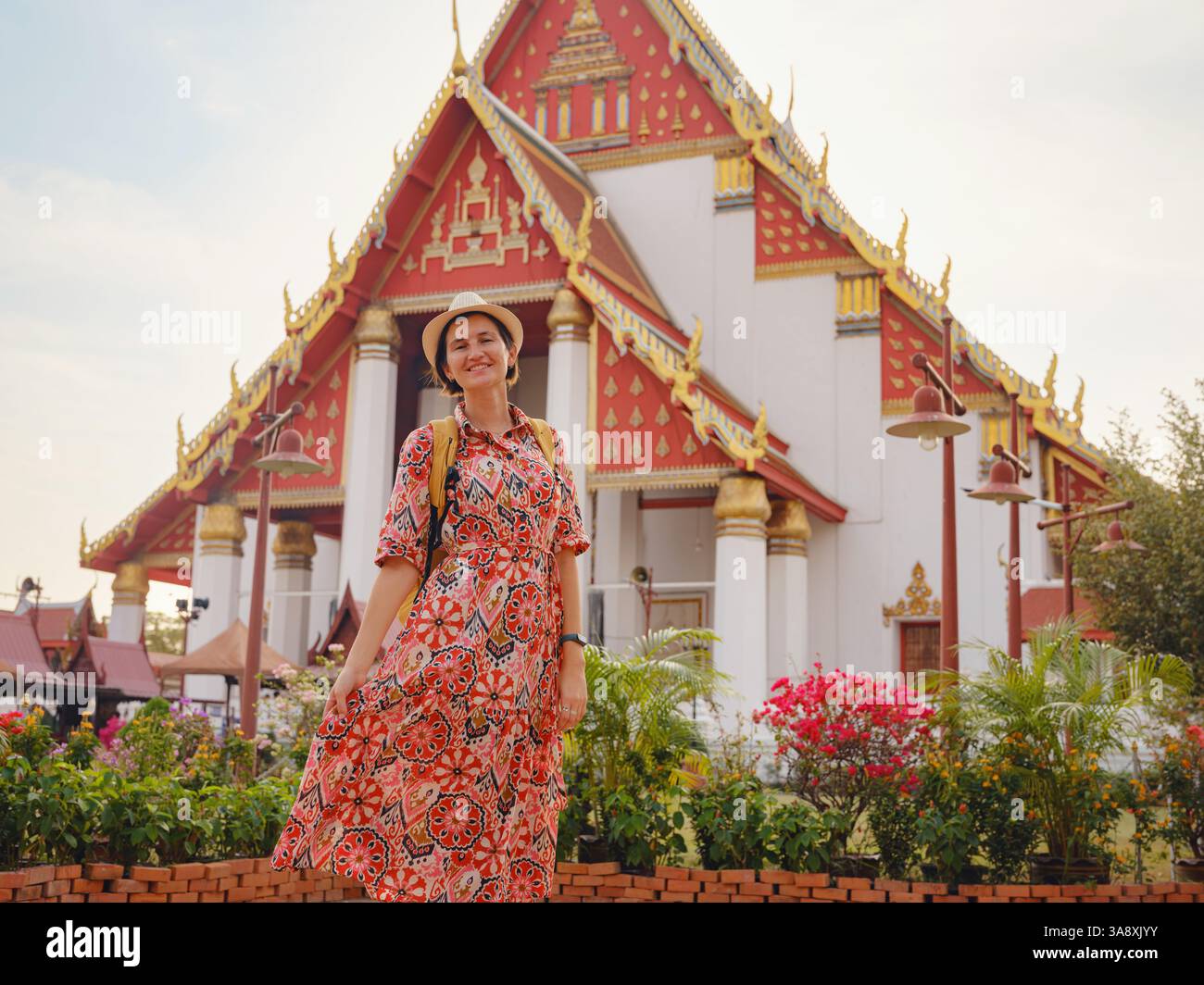 Travel to Ayutthaya, Thailand. Young female tourist explores modern ...