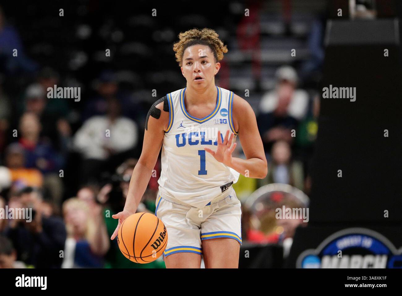 UCLA guard Kiki Rice (1) controls the ball during the second half ...