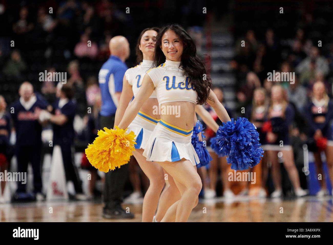 UCLA cheerleaders perform during the second half between UCLA and ...