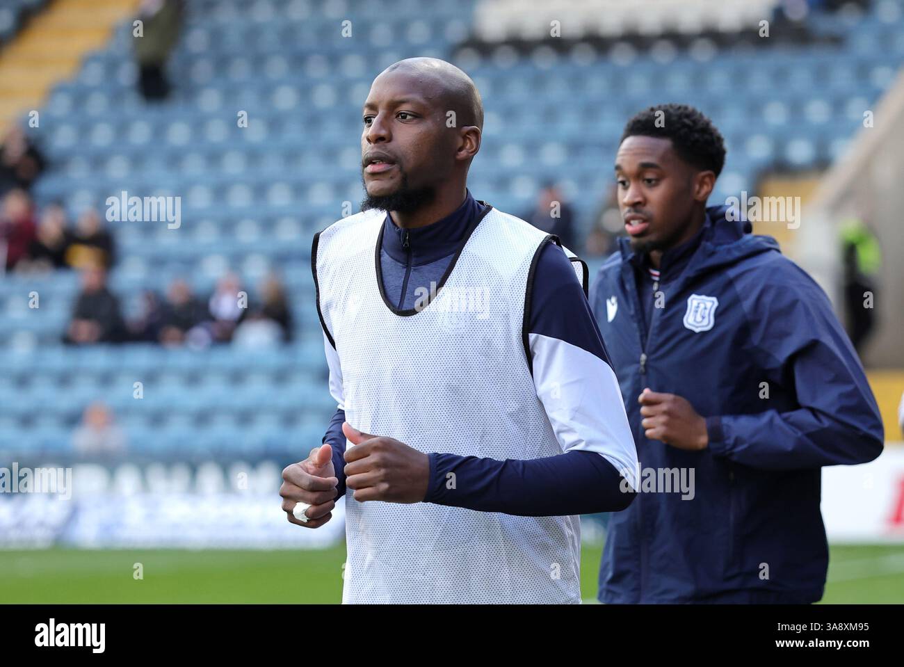 Dundee's Mohamed Sylla warming up ahead of the William Hill Premiership ...