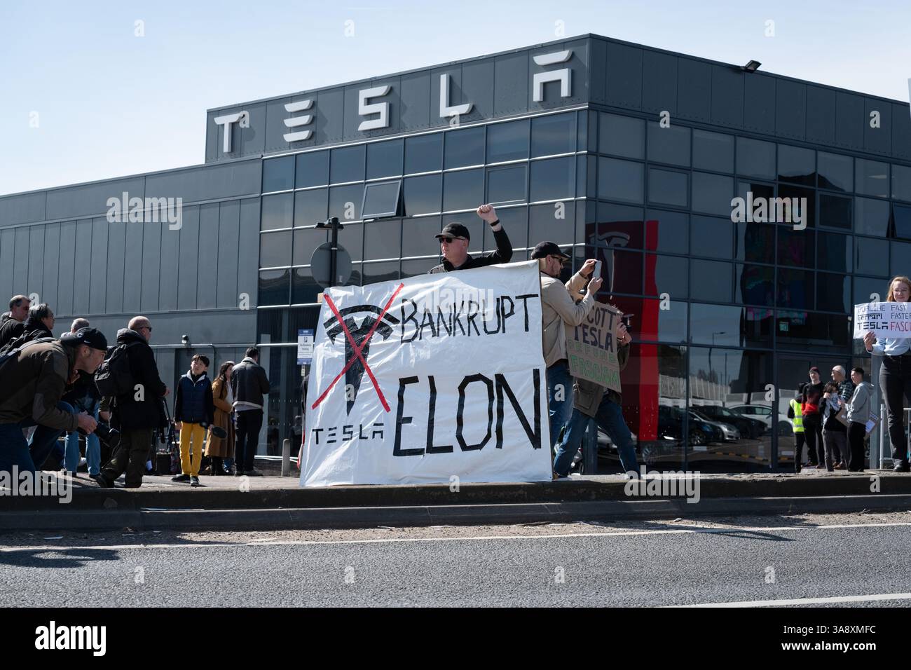 London, UK. 29 March, 2025. Critics of Elon Musk, CEO of Tesla, protest ...