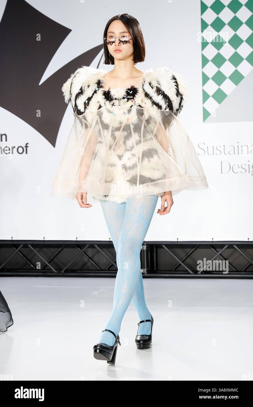 March 29, 2025, Tokyo, Japan: A model walks down a runway during the ...