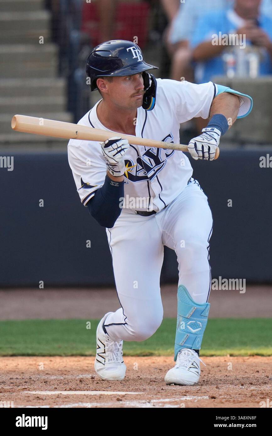 Tampa Bay Rays' Jonny DeLuca prepares to bunt against the Colorado ...