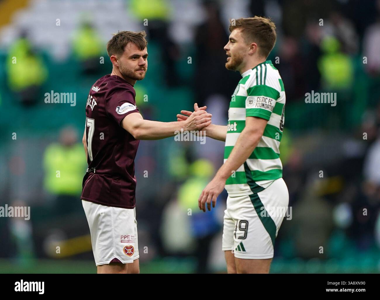 Heart of Midlothian's Alan Forrest (left) and Celtic's James Forrest ...
