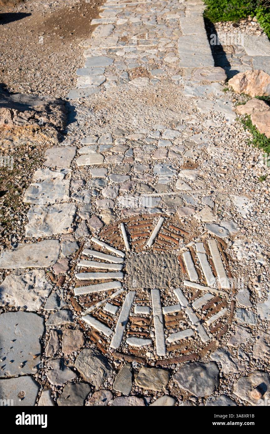 Detail of stone paved pathway with going up to Philopappos hill above ...