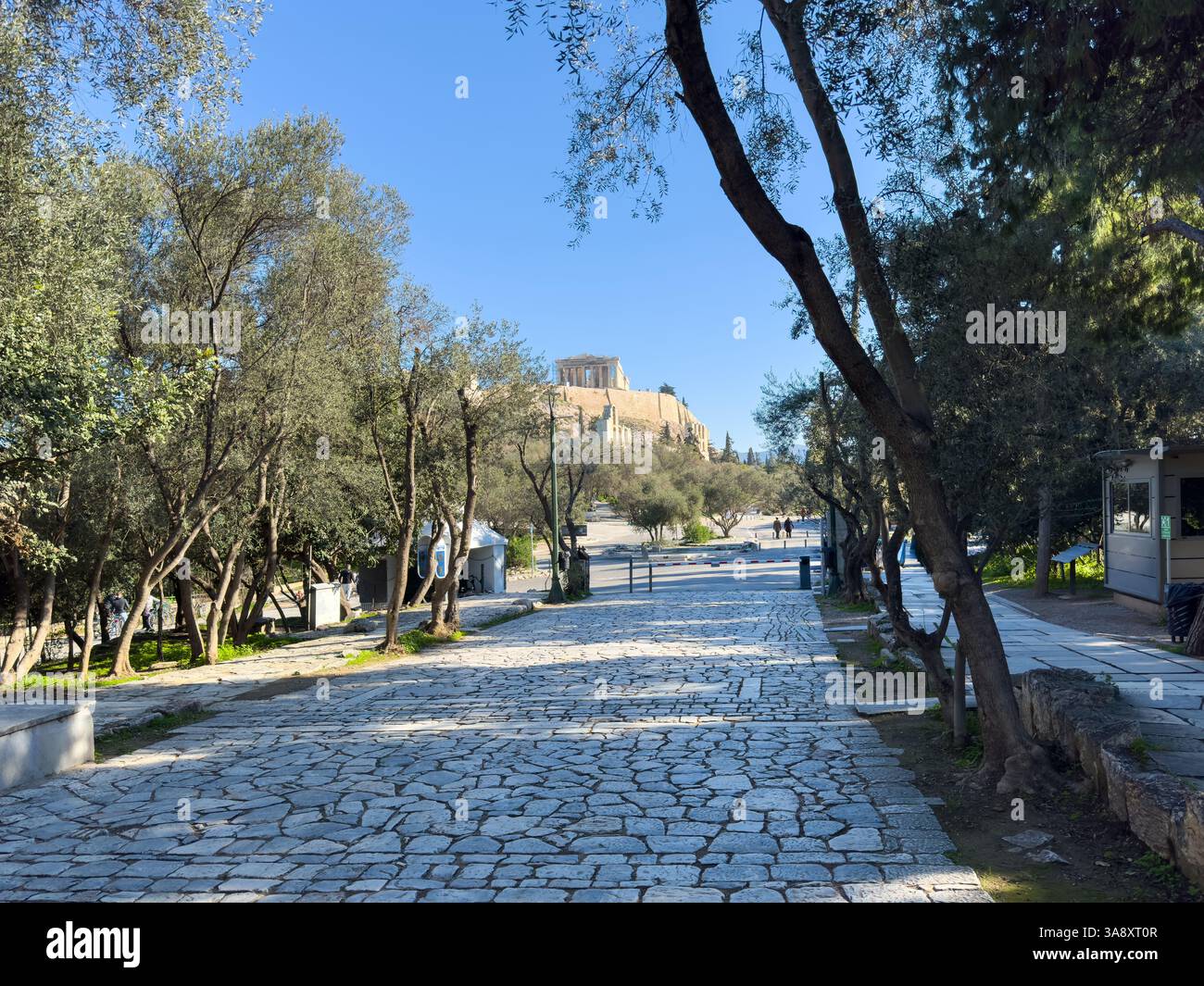 Athens, Greece. Parthenon on Acropolis hill and marble paved walkway ...