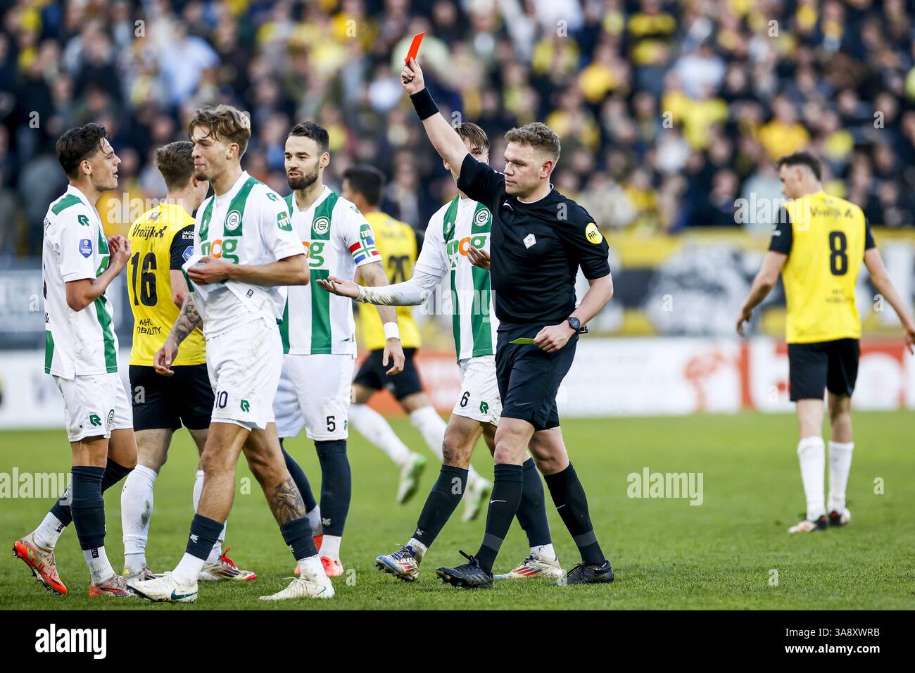 BREDA - Tika de Jonge of FC Groningen gets red from referee Alex Bos ...
