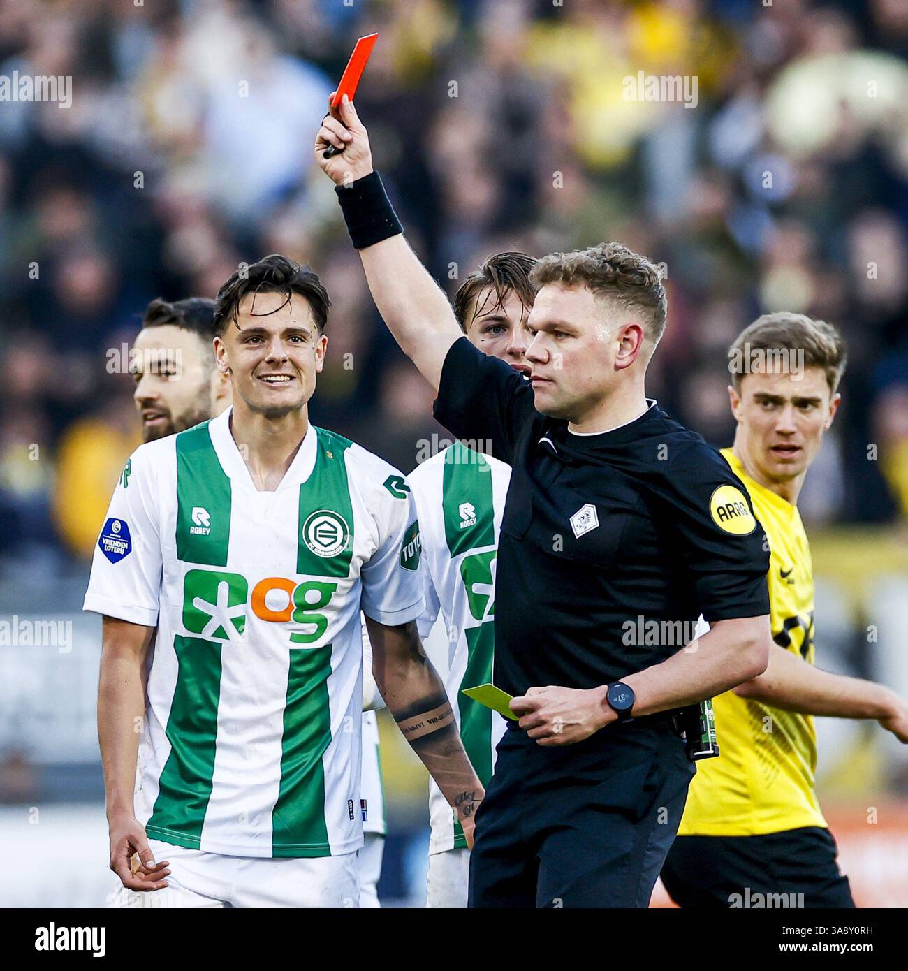 BREDA - Tika de Jonge of FC Groningen gets red from referee Alex Bos ...
