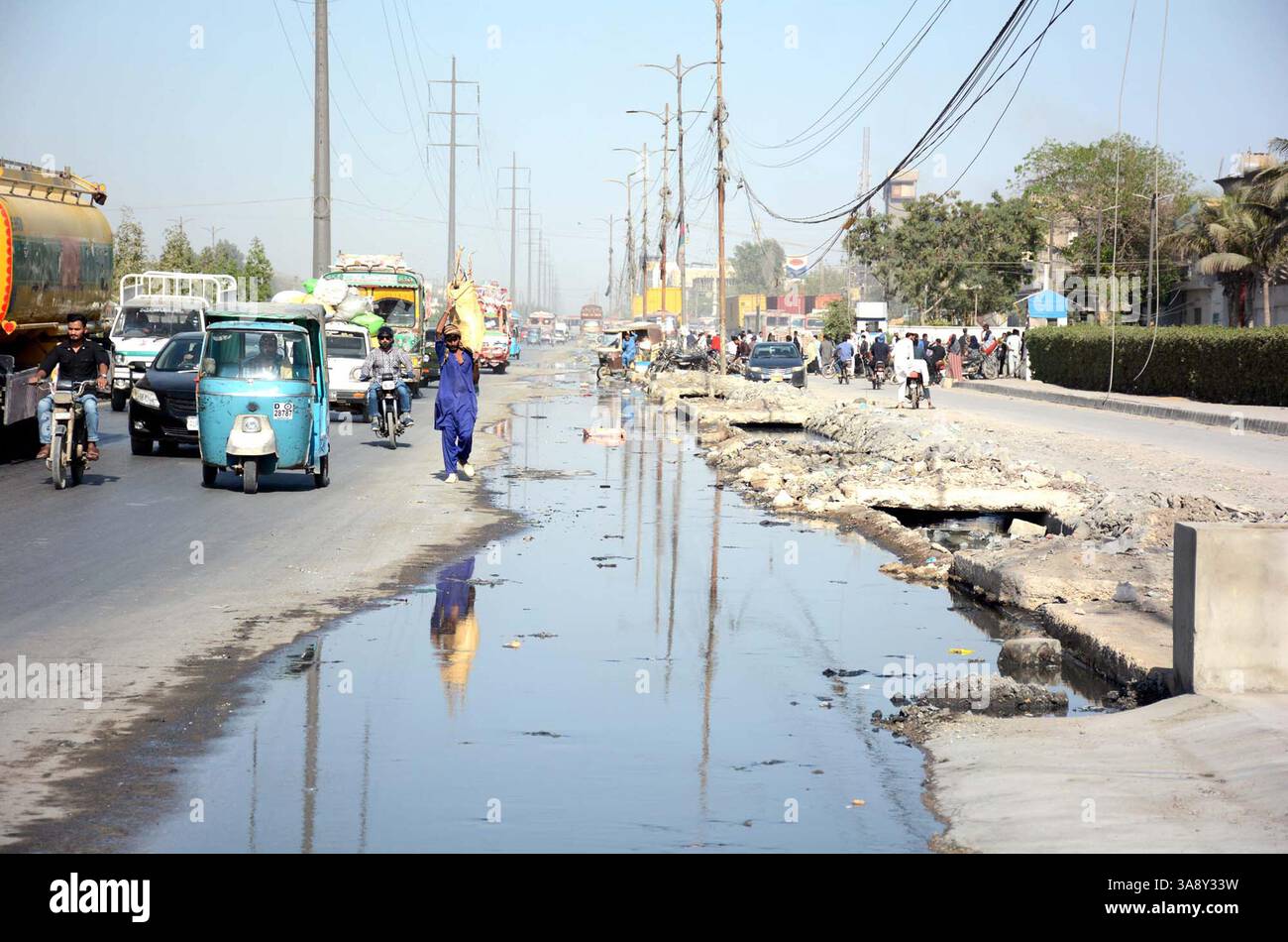 Inundated road by overflowing sewerage water, creating problems for ...