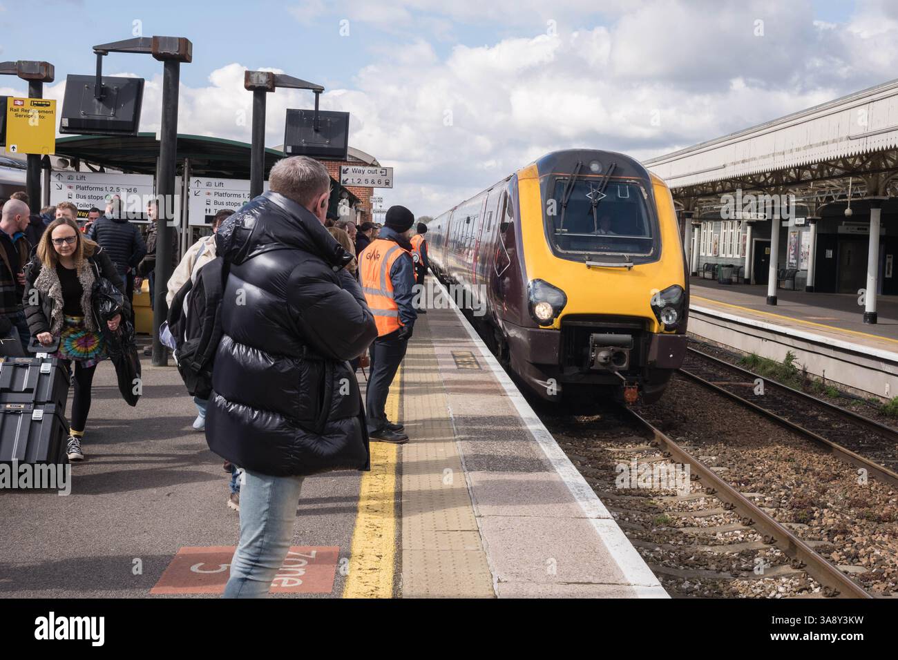 Passengers waiting on the platform for a train at Taunton station ...