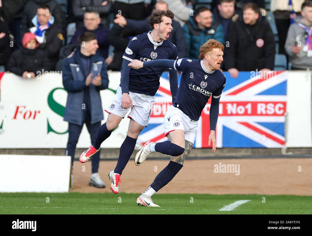 Dundee's Simon Murray celebrates scoring their side's first goal of the ...