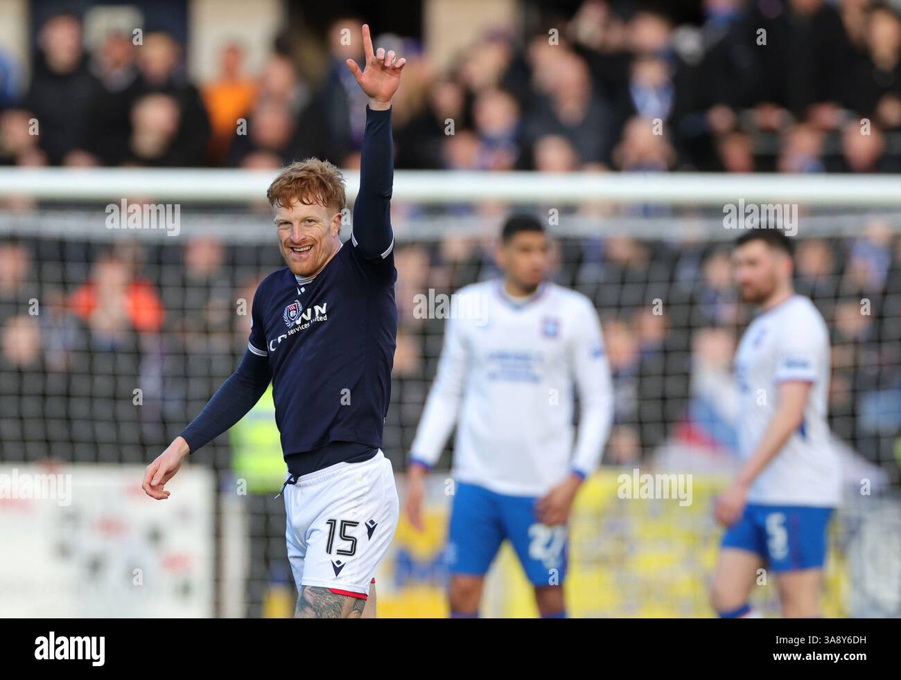 Dundee's Simon Murray celebrates scoring their side's first goal of the ...
