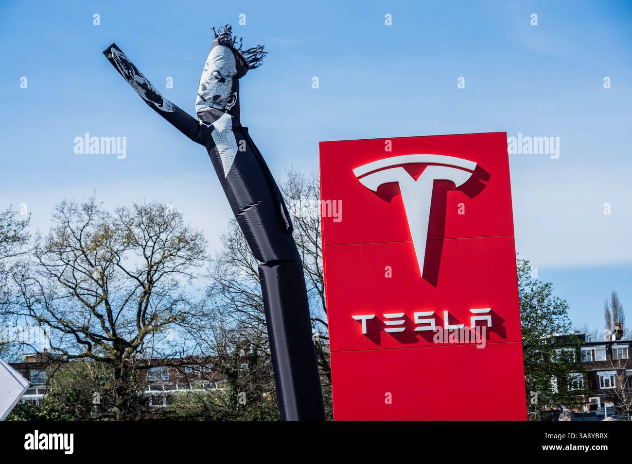 A blow-up inflatable reproduces Elon Musk's infamous Nazi salute during ...