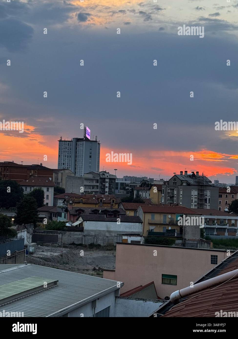 Italian City Sunset: Rooftop View Stock Photo - Alamy