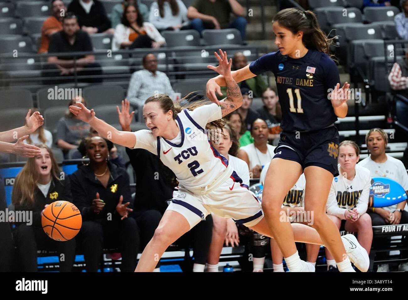 TCU guard Madison Conner (2) and Notre Dame guard Sonia Citron (11 ...
