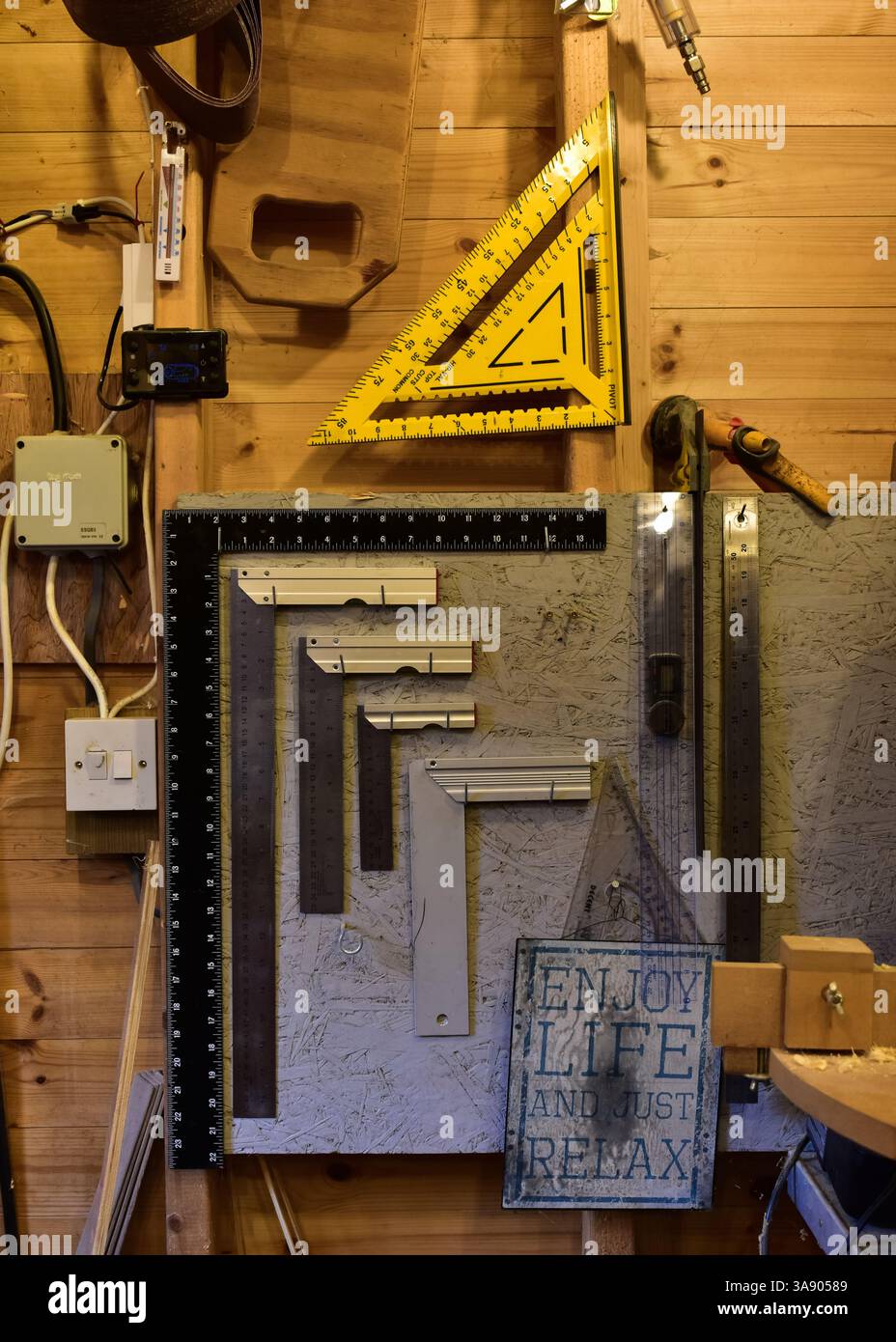 Carpentry workshop with various hanging tools Stock Photo - Alamy