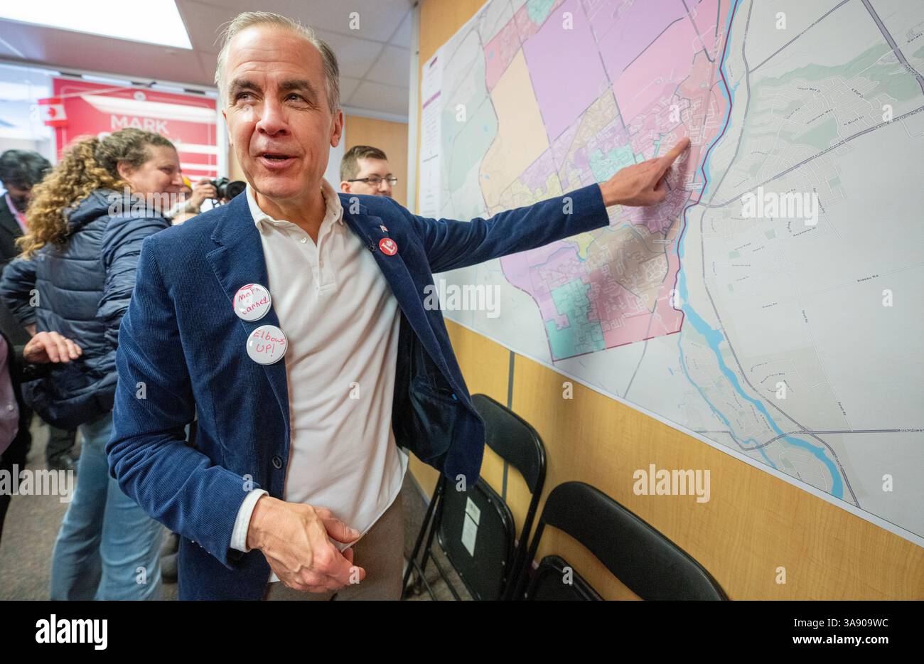 Nepean, Canada. 29th Mar, 2025. Liberal Leader Mark Carney looks over a ...