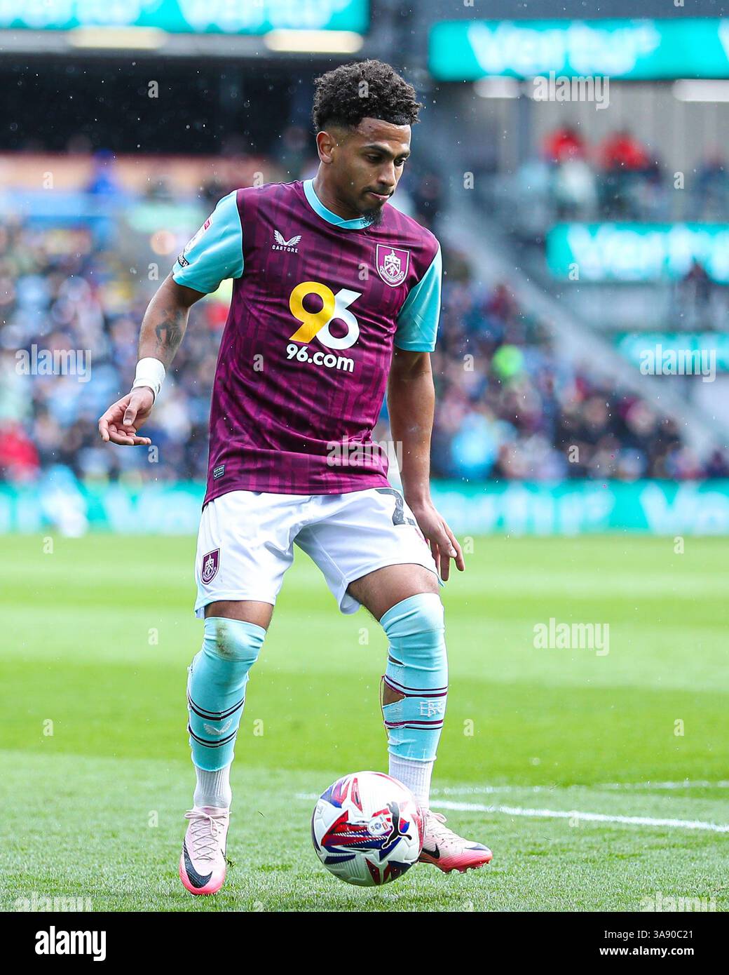 Burnley, UK. 29th Mar, 2025. Marcus Edwards of Burnley with ball at his ...