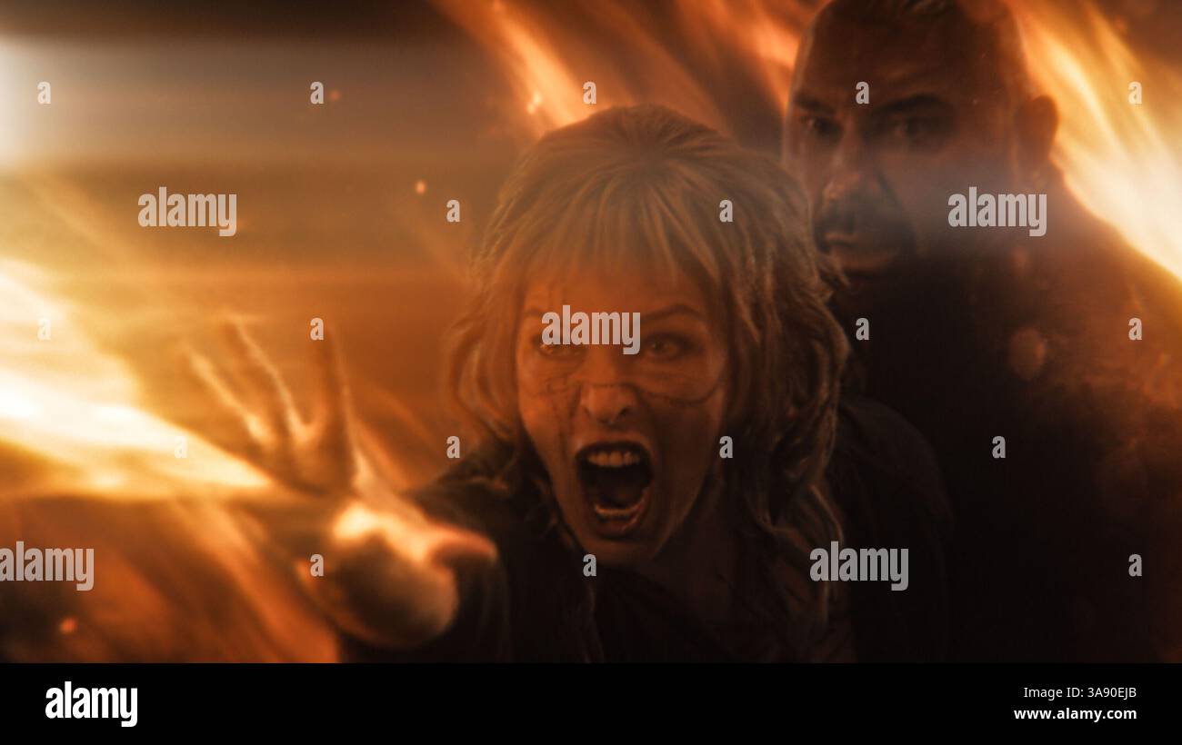 In the Lost Lands Milla Jovovich & Dave Bautista Stock Photo - Alamy