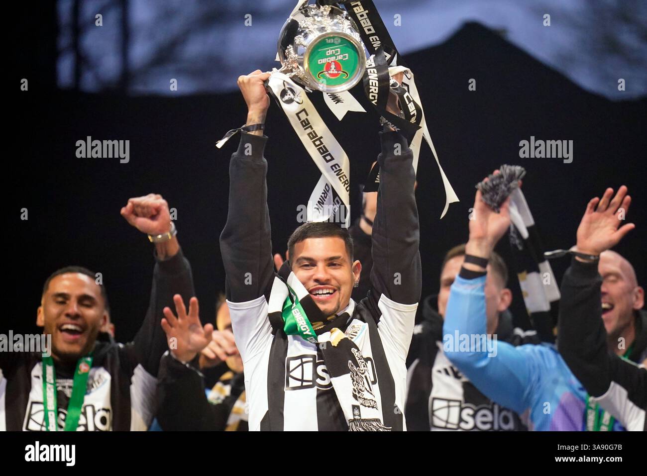 Newcastle United's Bruno Guimaraes with the Carabao cup on stage during ...
