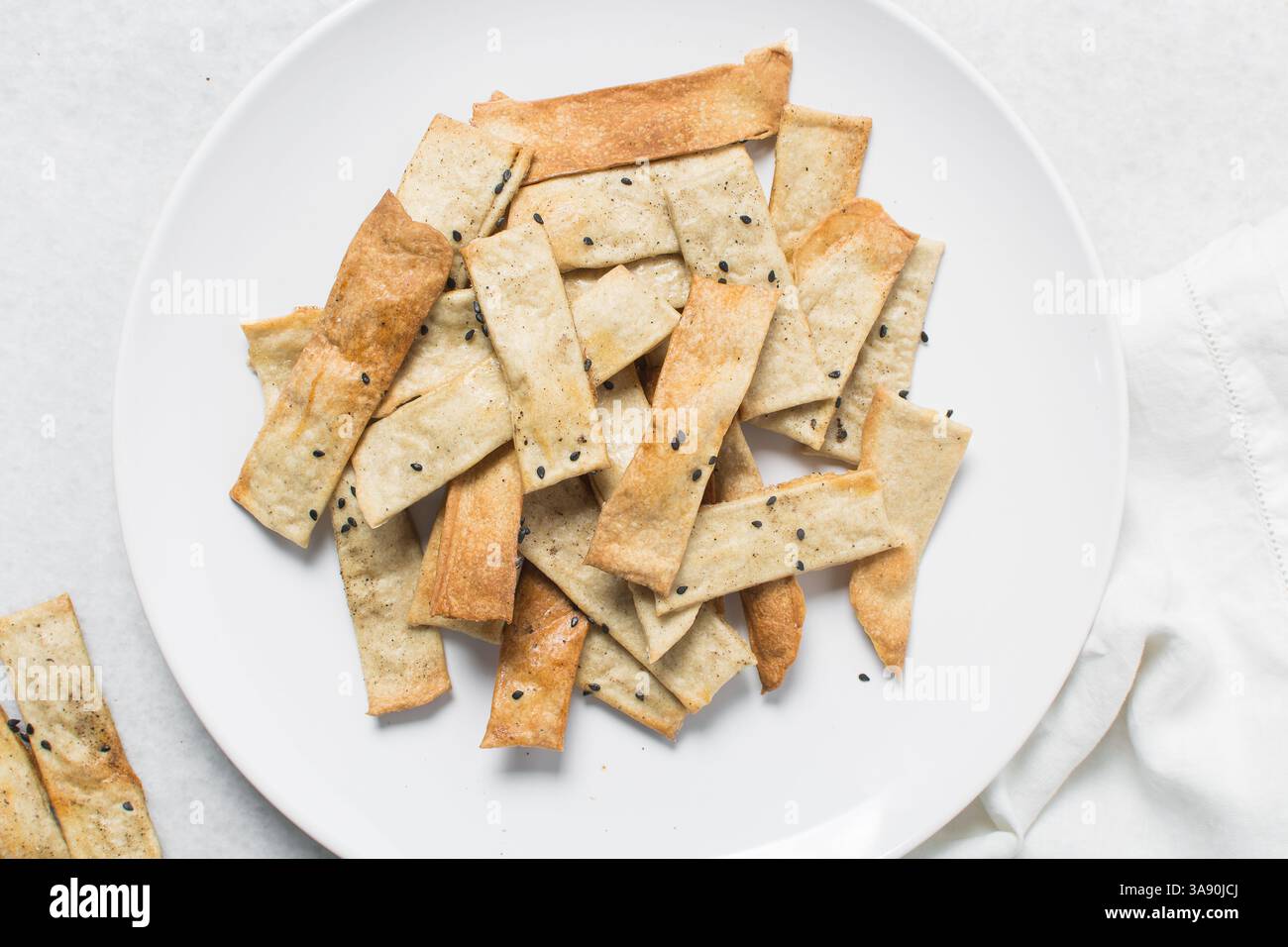 Overhead view of homemade crackers, top view of freshly baked black ...
