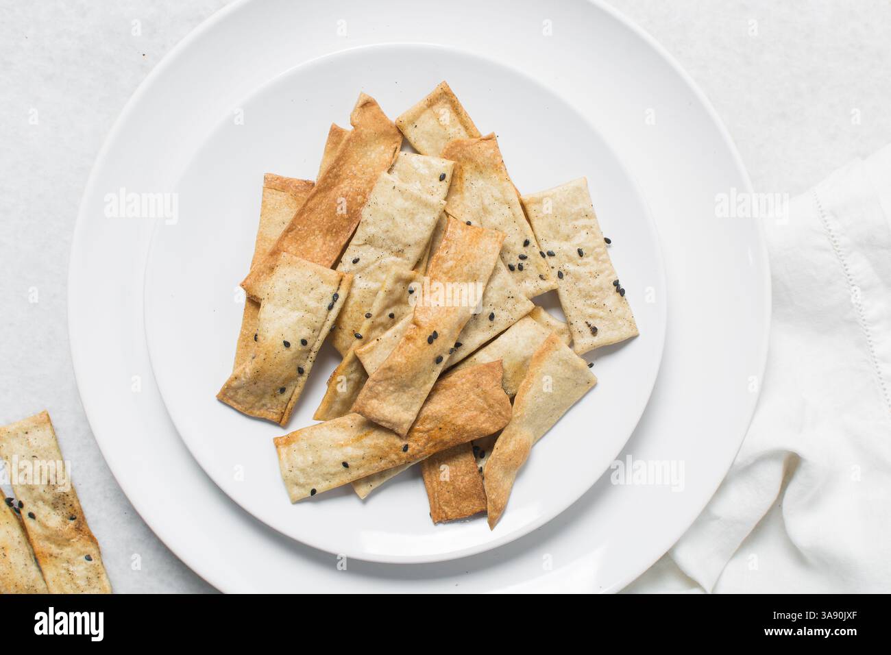 Overhead view of homemade crackers, top view of freshly baked black ...