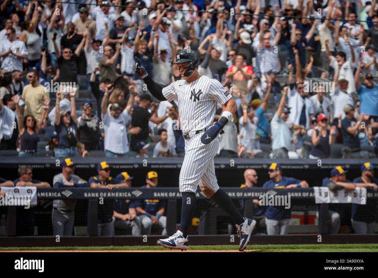 New York Yankees' Aaron Judge (99) heads home after hitting a grand ...