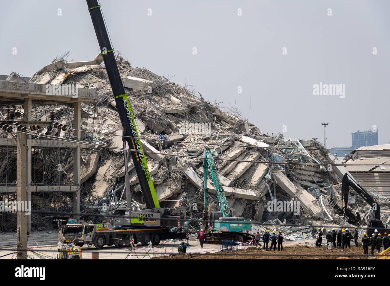 A close view of the rescue teams working with various equipment at the ...