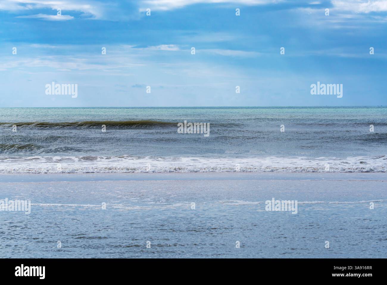 Gentle waves roll toward shore hi-res stock photography and images - Alamy