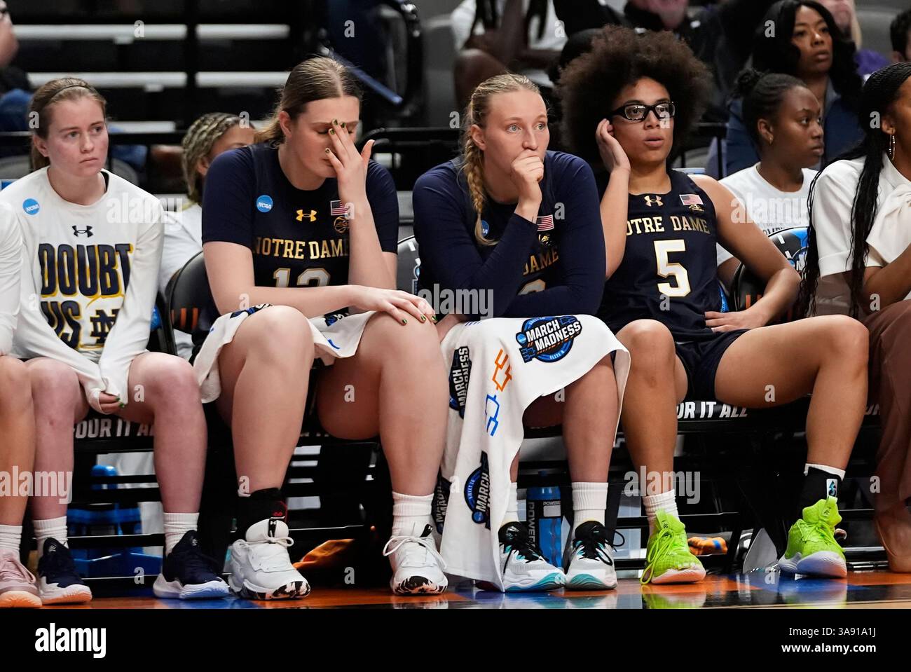 The Notre Dame bench reacts during the second half against TCU in the ...
